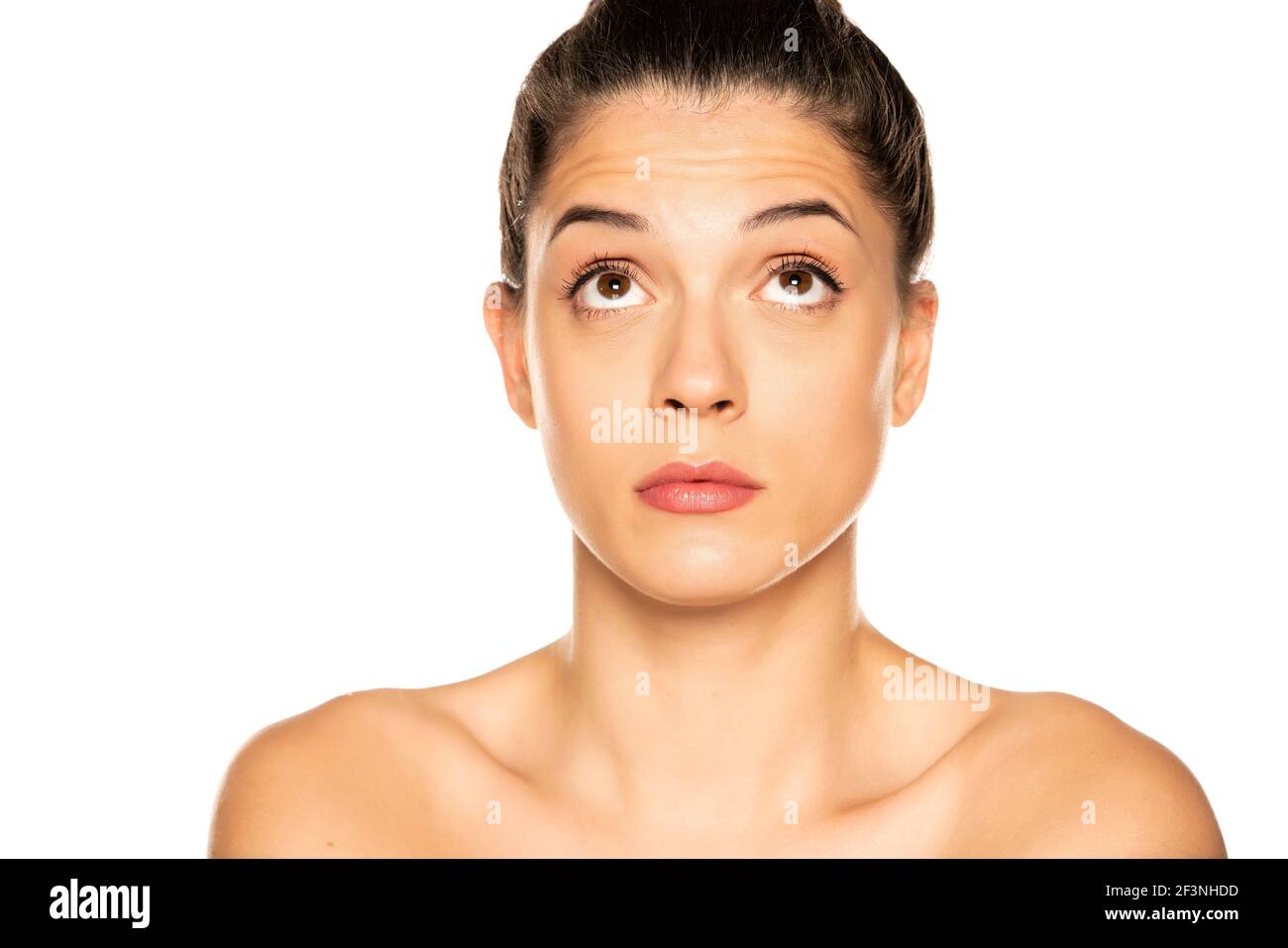 Beautiful woman looking up hi-res stock photography and images - Alamy