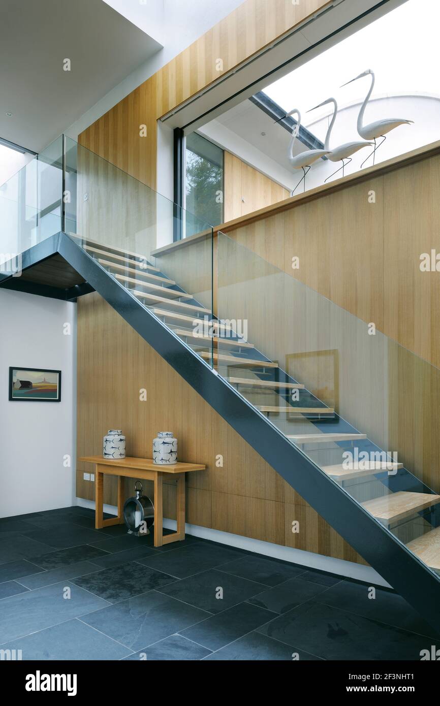 Looking from lower ground floor to the staircase and the ground level ...