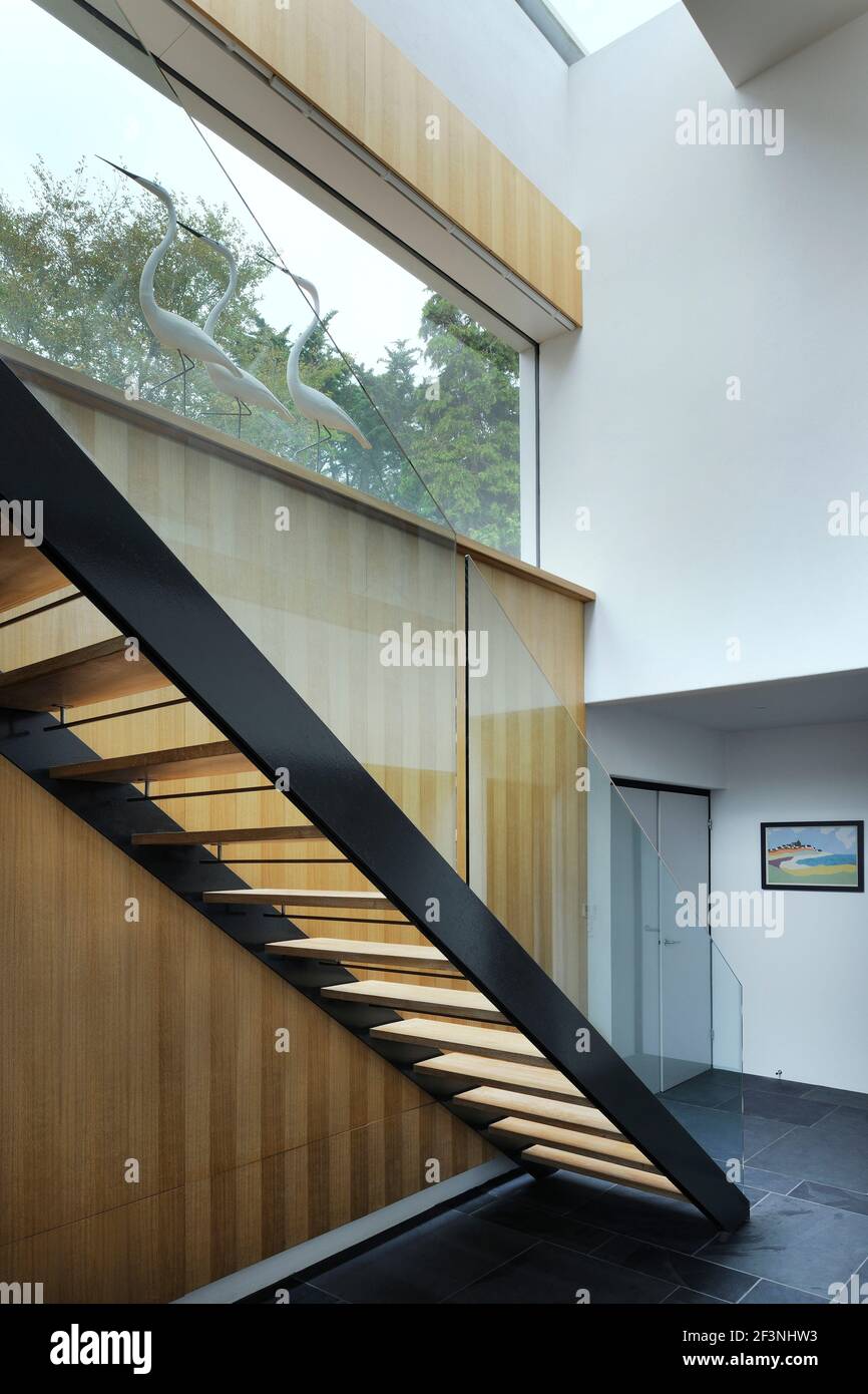 Looking from lower ground floor to the staircase and the ground level ...