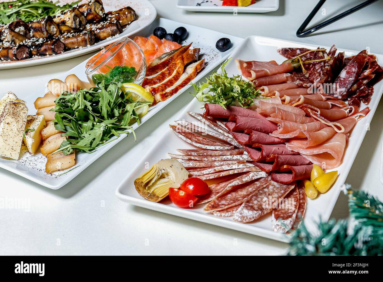 Meat snacks whith greens at the buffet Stock Photo - Alamy