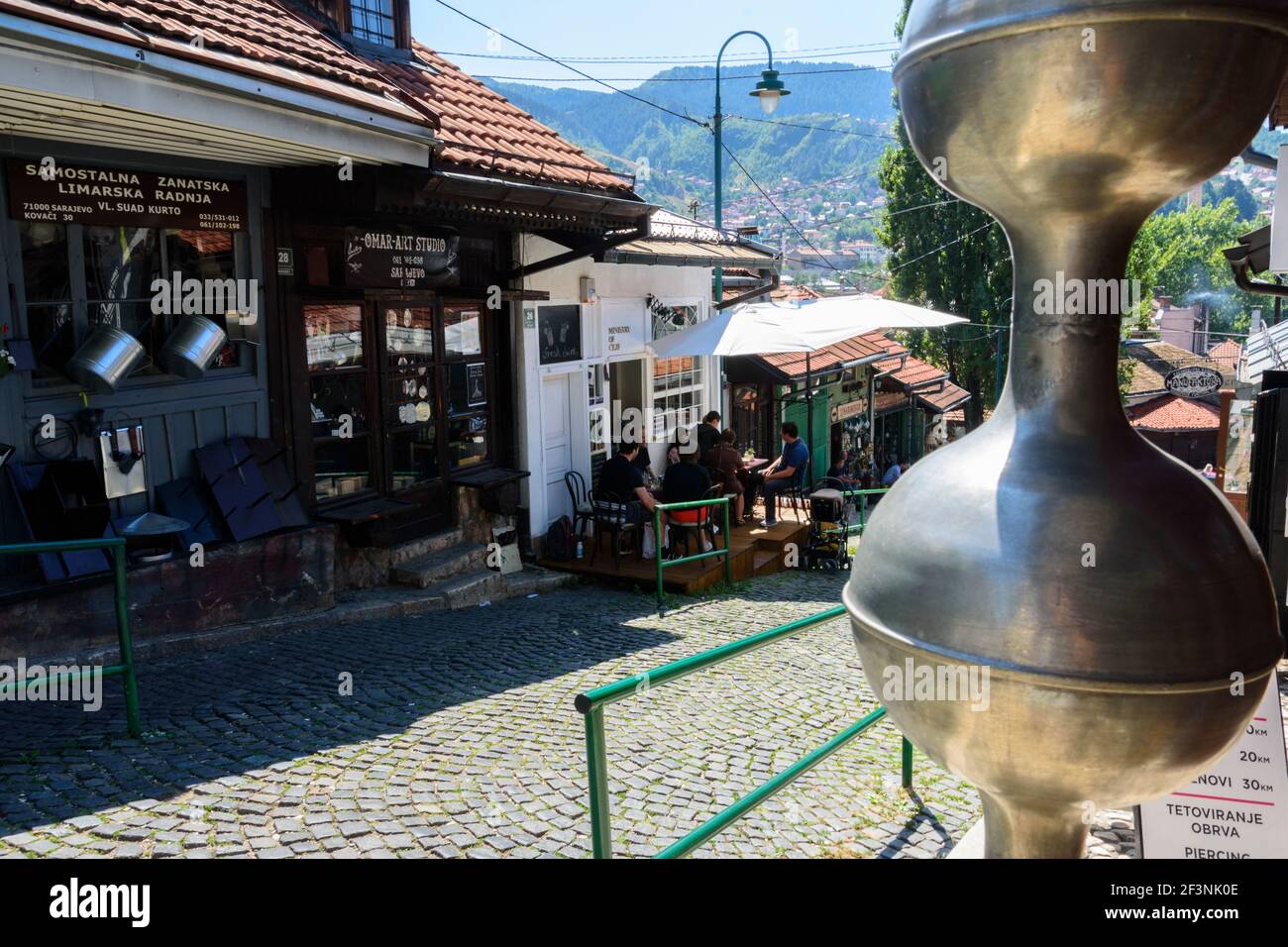 Tourists in Baščaršija, the old bazaar and the historical and cultural ...