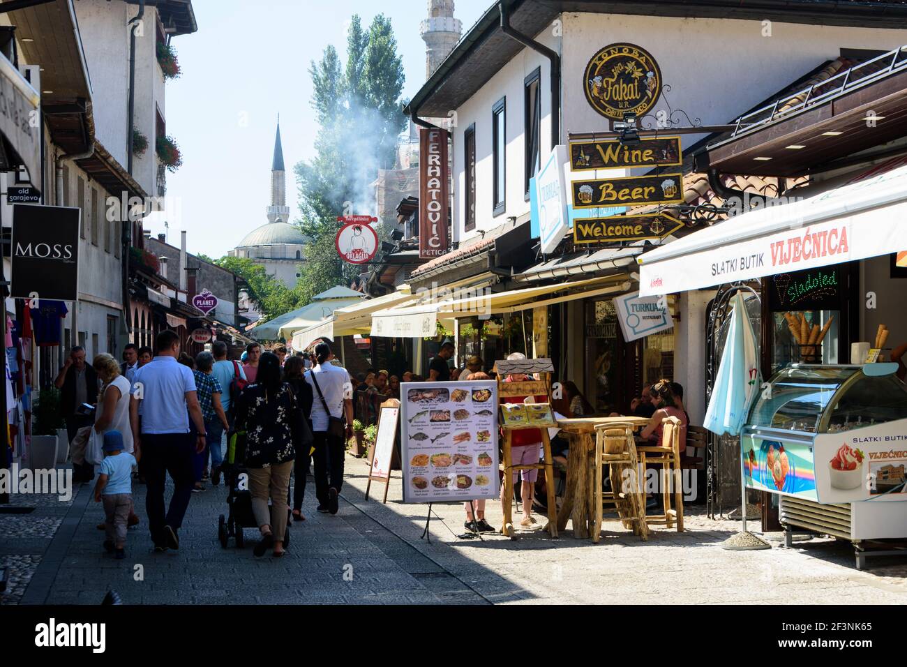 Tourists in Baščaršija, the old bazaar and the historical and cultural ...