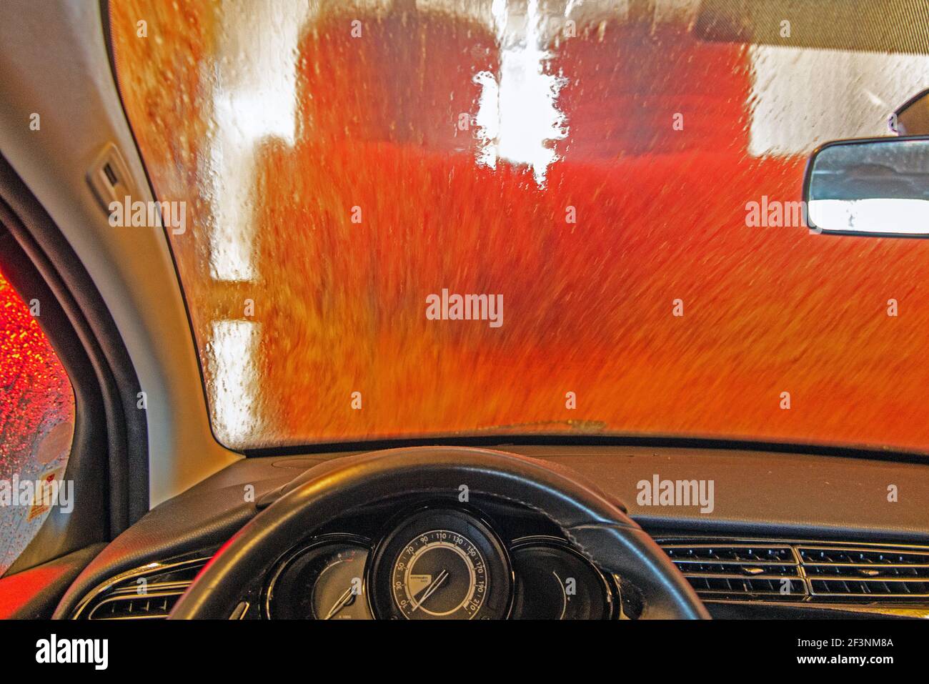 View through the windshield of an automobile in an automated car wash ...