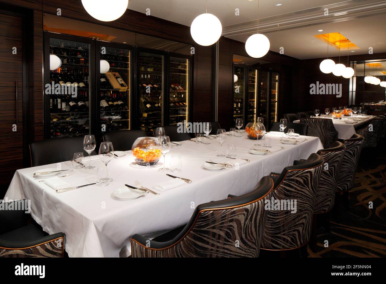Private dining room with built in wine cabinets | | Designer: RPW Stock ...