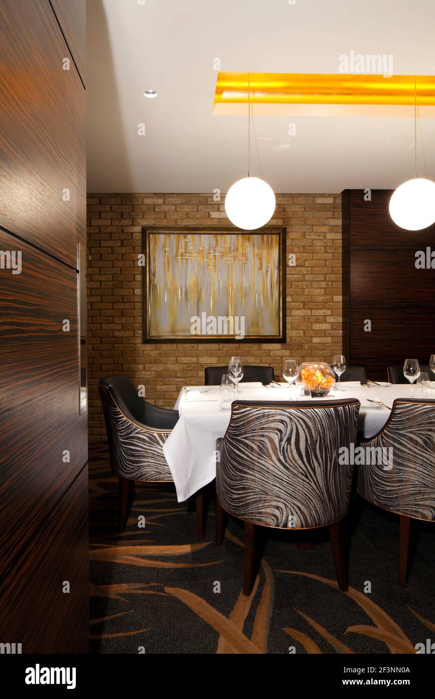 One end of private dining room with patterned carpet | | Designer: RPW ...