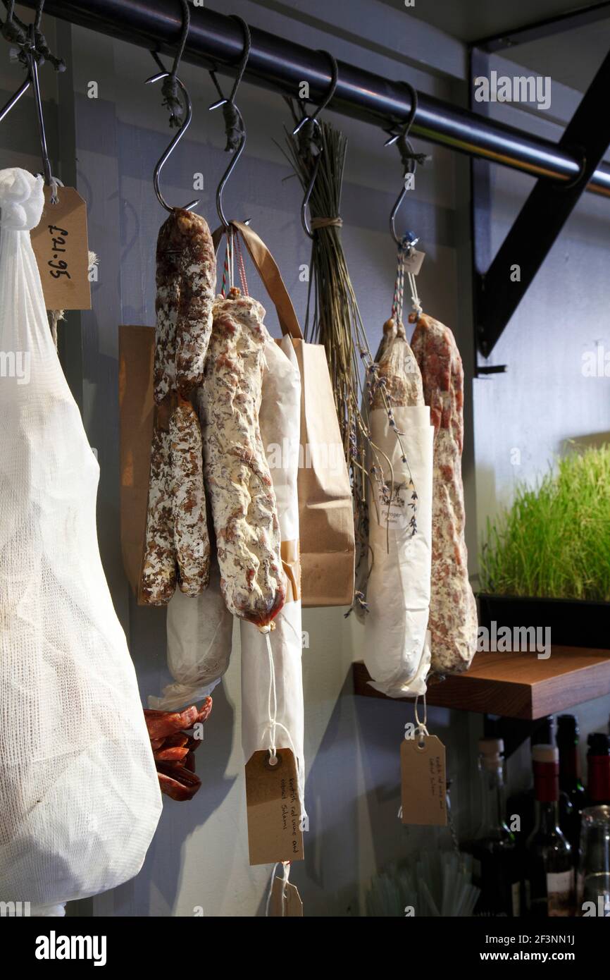Charcuterie hanging from meat hooks | | Designer: Central Design Studio ...
