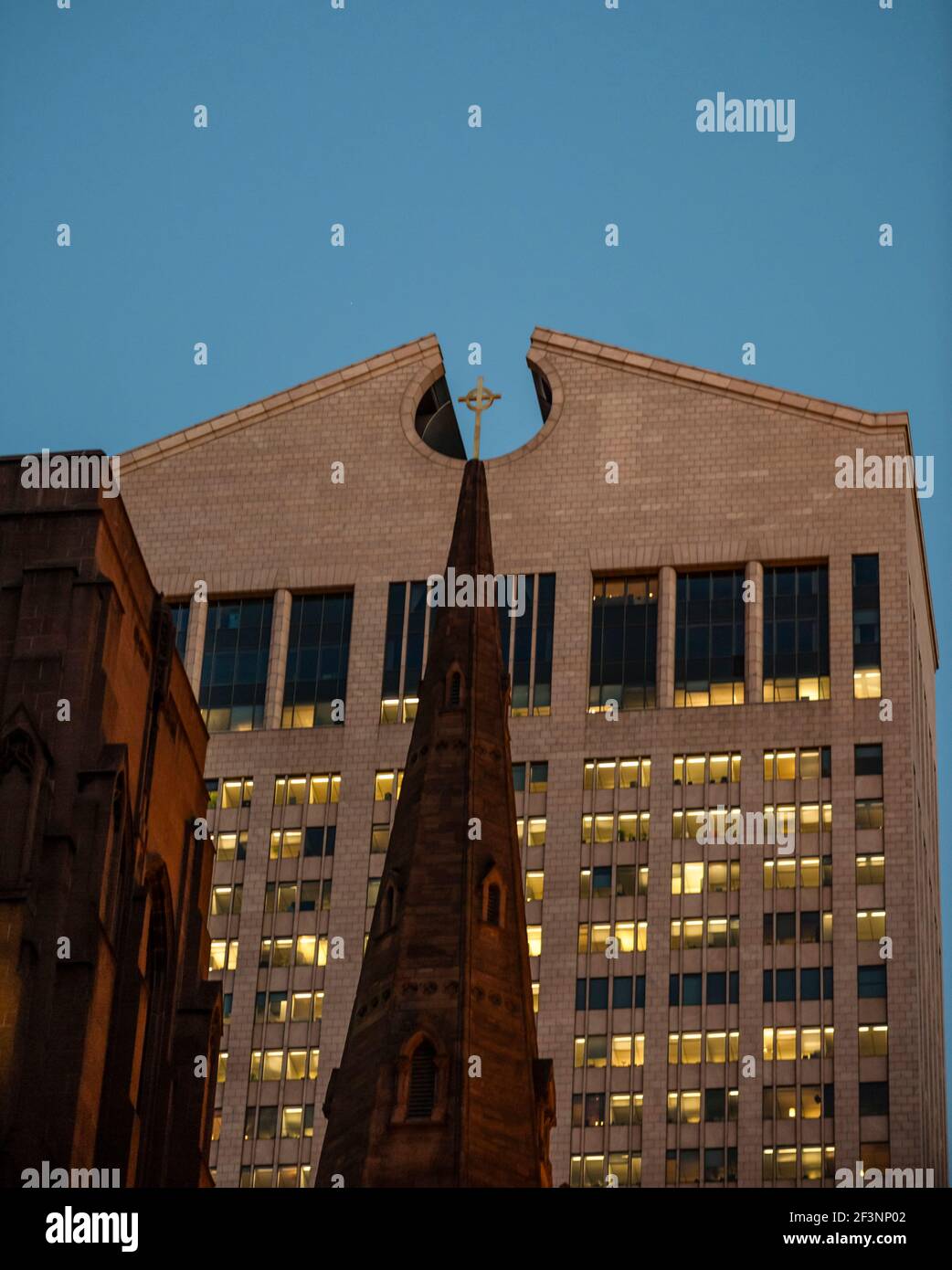 Detail of Sony Building, with a cross from a church spire in the centre ...