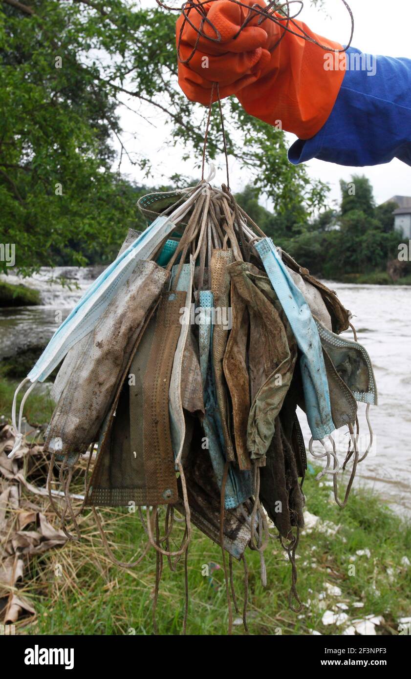 Medical Face Mask Waste in the Ciliwung River, Indonesia Stock Photo ...