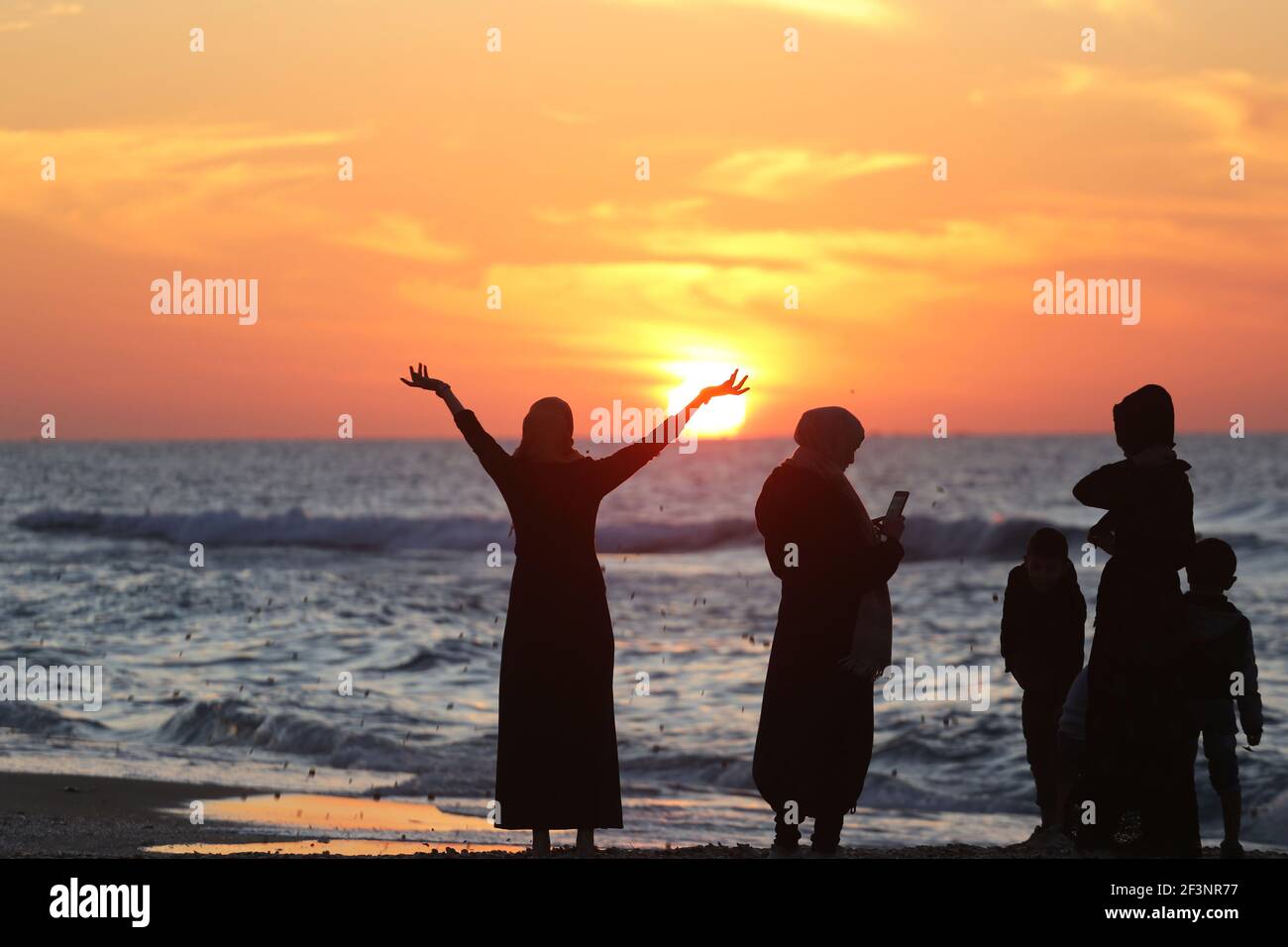 Daily life during sunset in Gaza Stock Photo - Alamy