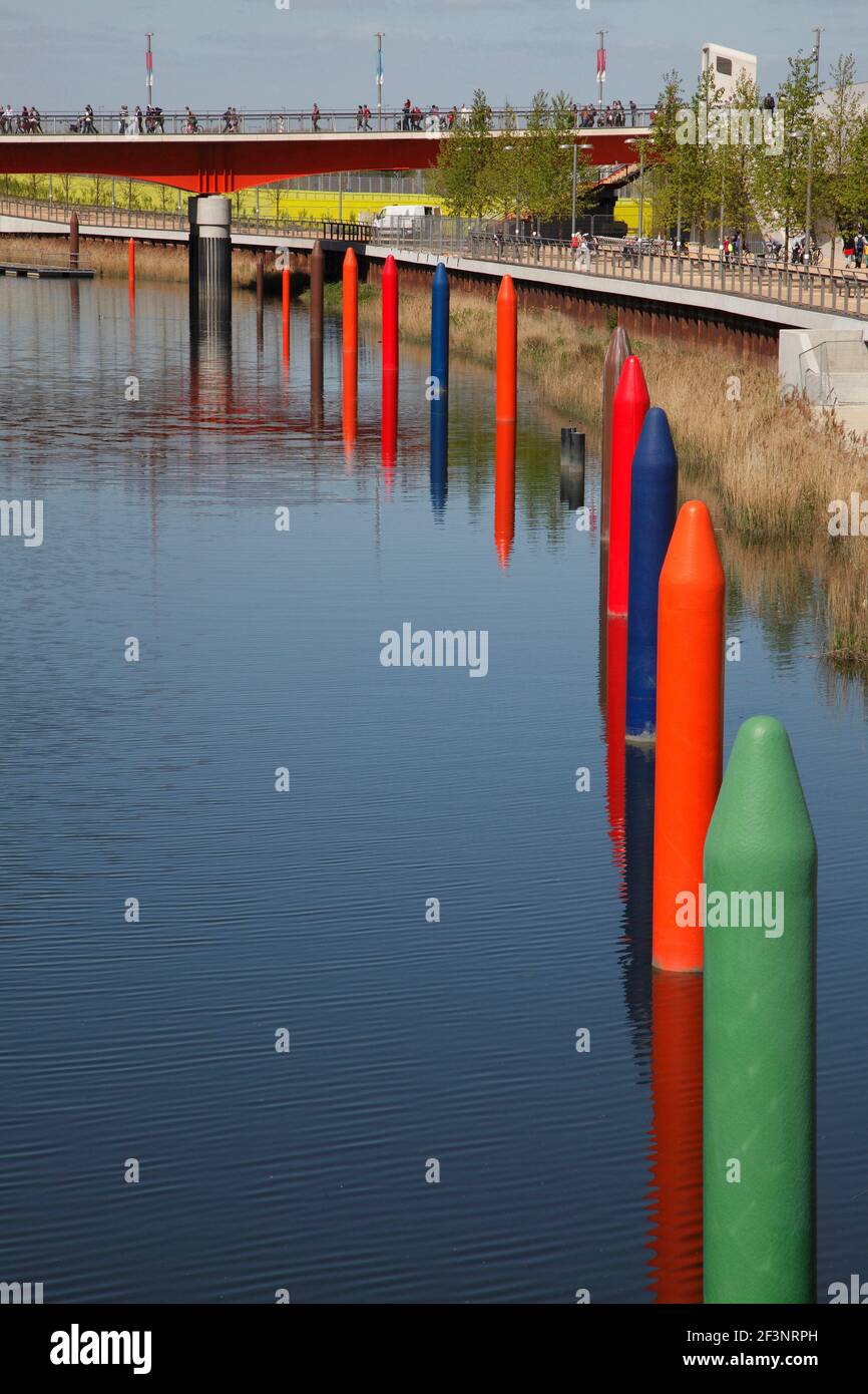 Mooring poles shaped like giant crayons Stock Photo - Alamy