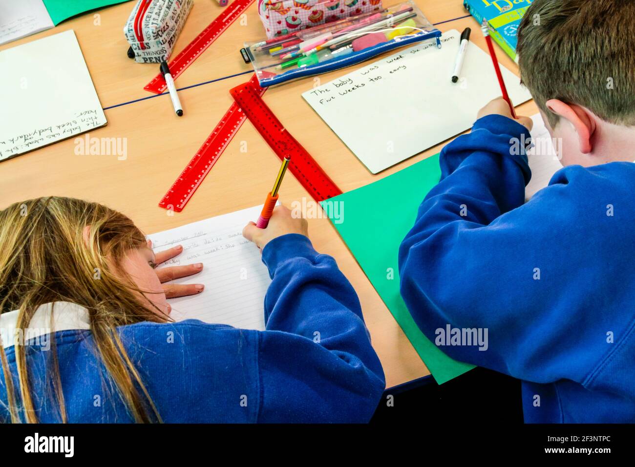School uniform children desk hi-res stock photography and images - Alamy