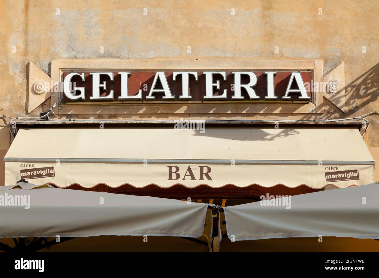 General views of typical Tuscan architecture, houses and shops in Lucca ...