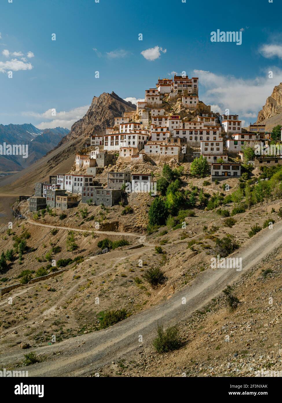 Ancient Key Monastery flanked by the high Himalayas and the Spiti river ...