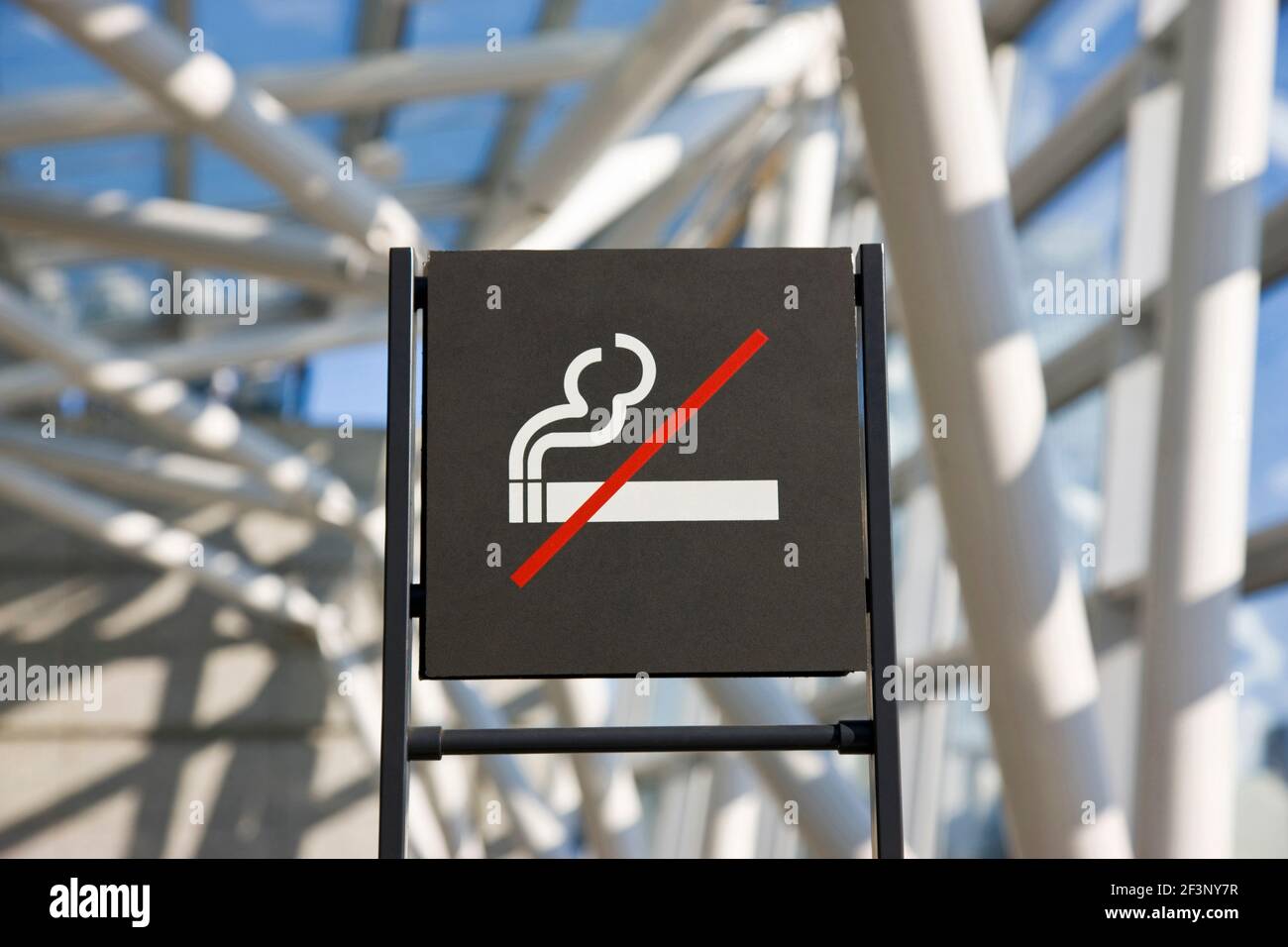 A detailed interior view shows a simple No Smoking sign amidst unique ...