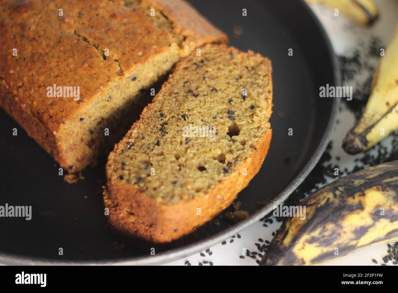 Slices of home baked whole wheat ripe plantain cake. It is also called ...