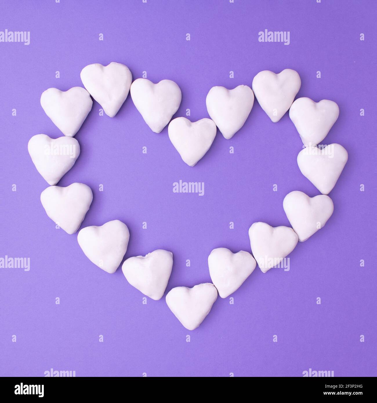 Square love concept idea with big heart made from small white hearts on ...