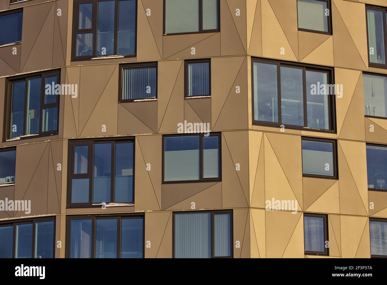 Residential high-rise buildings with irregular shaped and sized windows ...