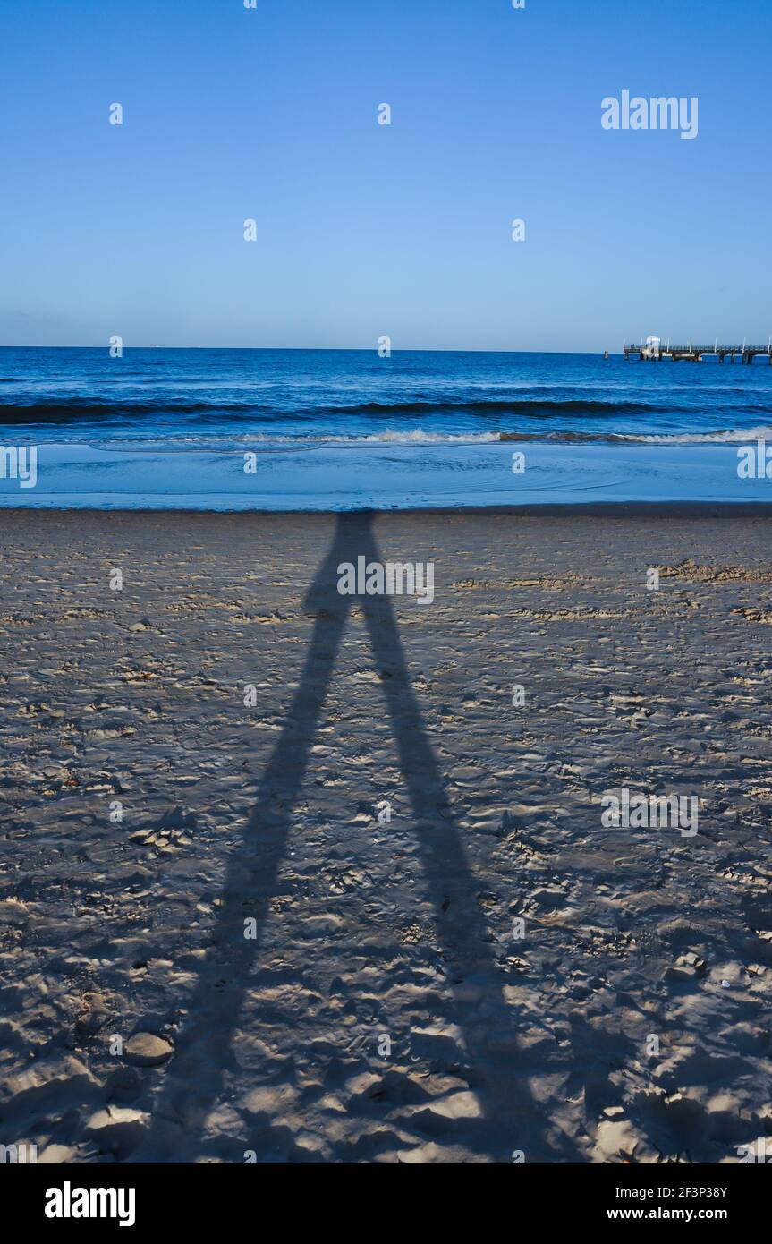 Human shadow on beach hi-res stock photography and images - Alamy