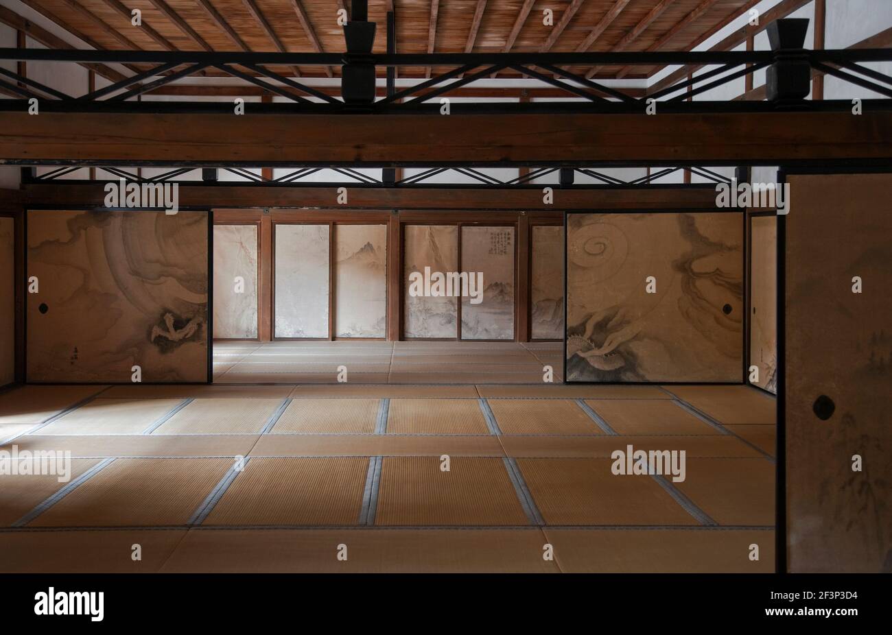 An interior view with natural light shows the tatami mat rooms with ...