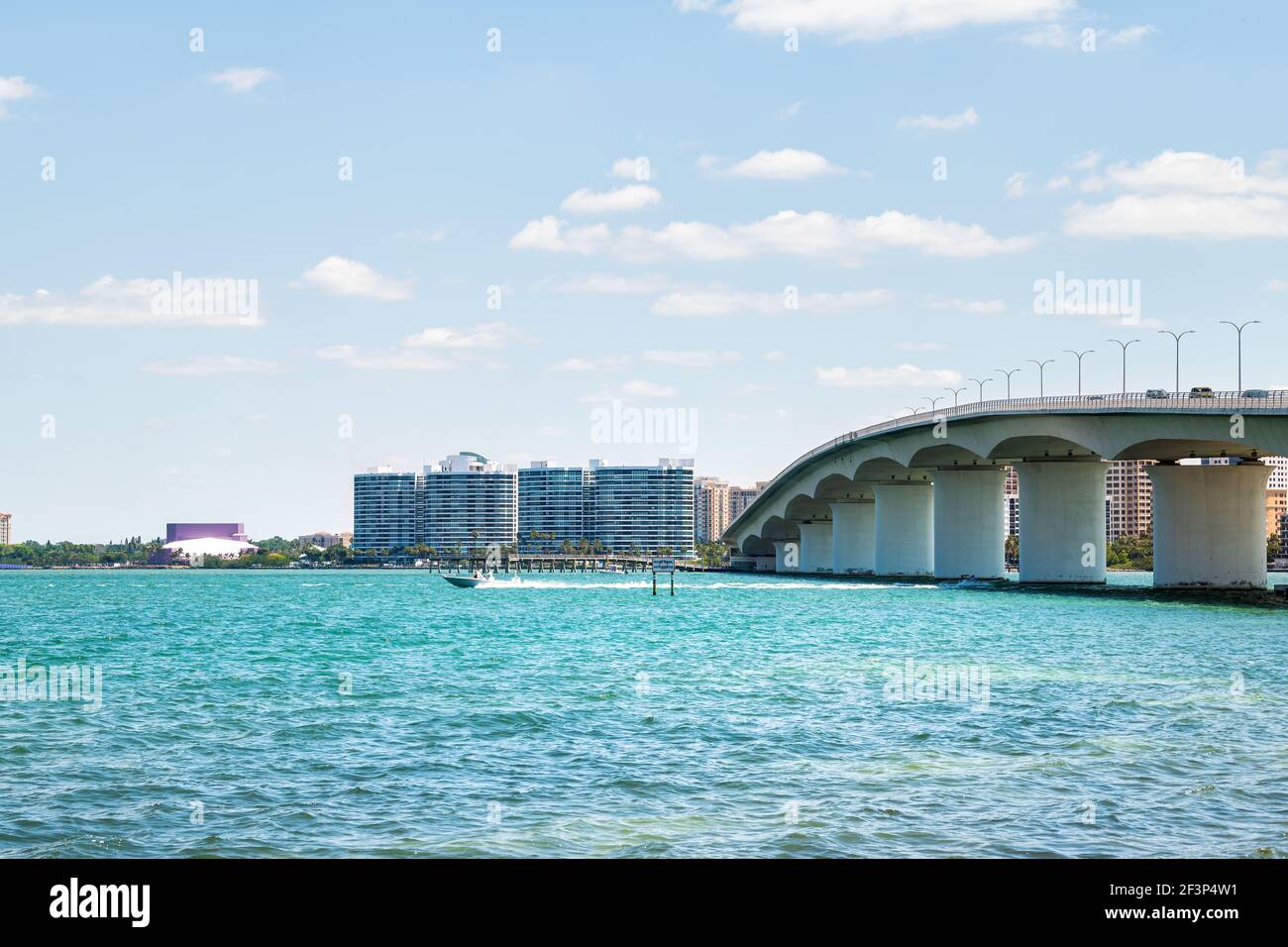 Beach in city of Sarasota, Florida on sunny day with cityscape and bay ...