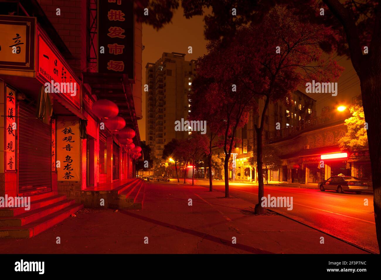 Bright neon lights illuminate the empty streets - Shanghai Stock Photo ...