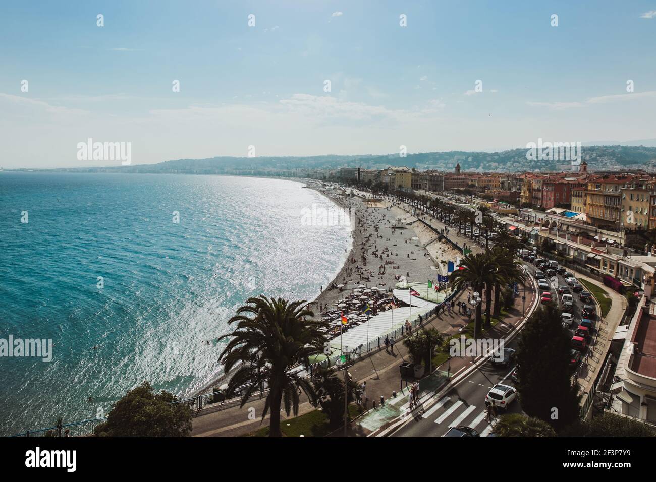 Panoramic view of Nice coastline and beach with blue sky, France ...