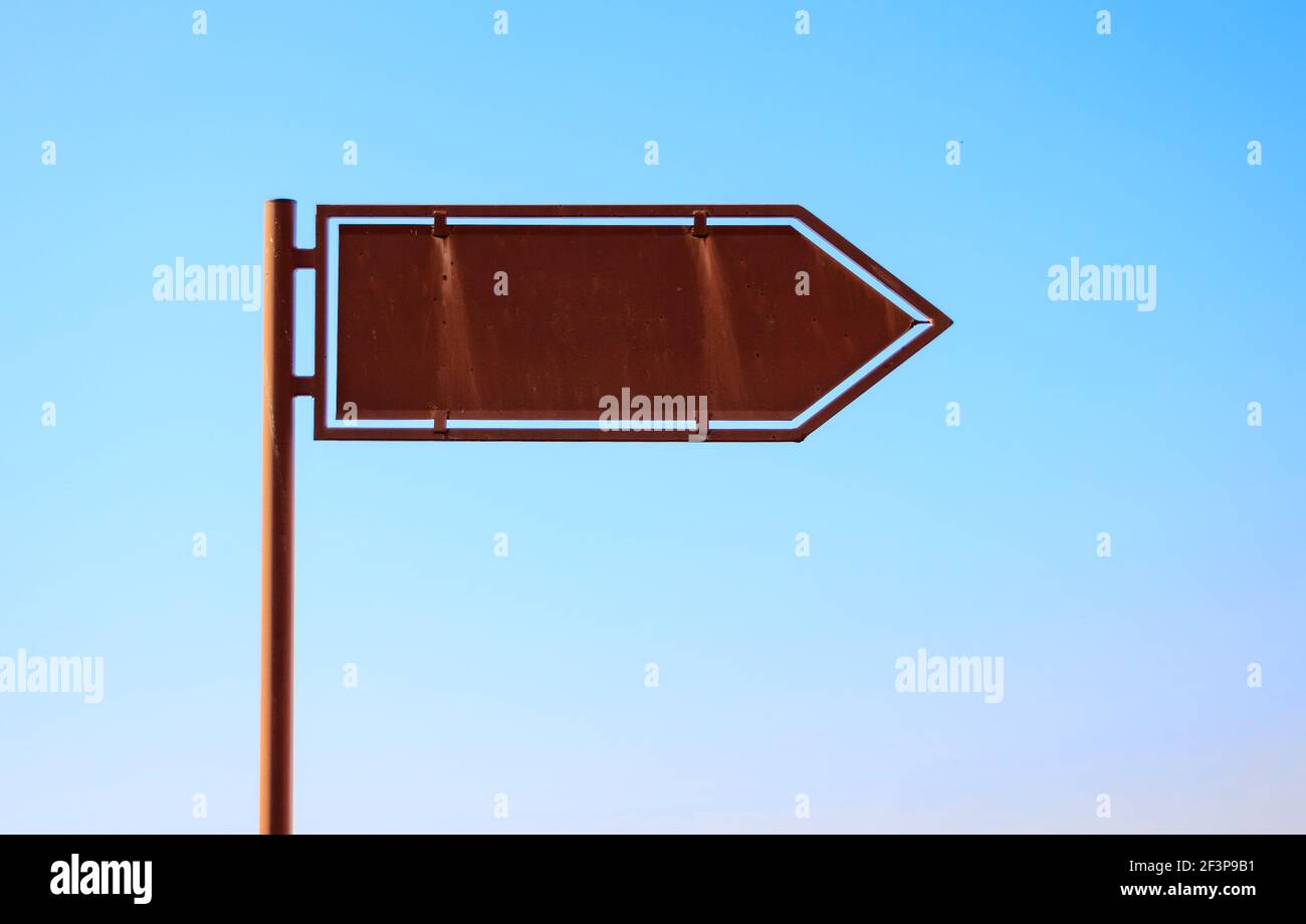 Empty arrow sign for mockup, on clear blue sky, copy space Stock Photo ...