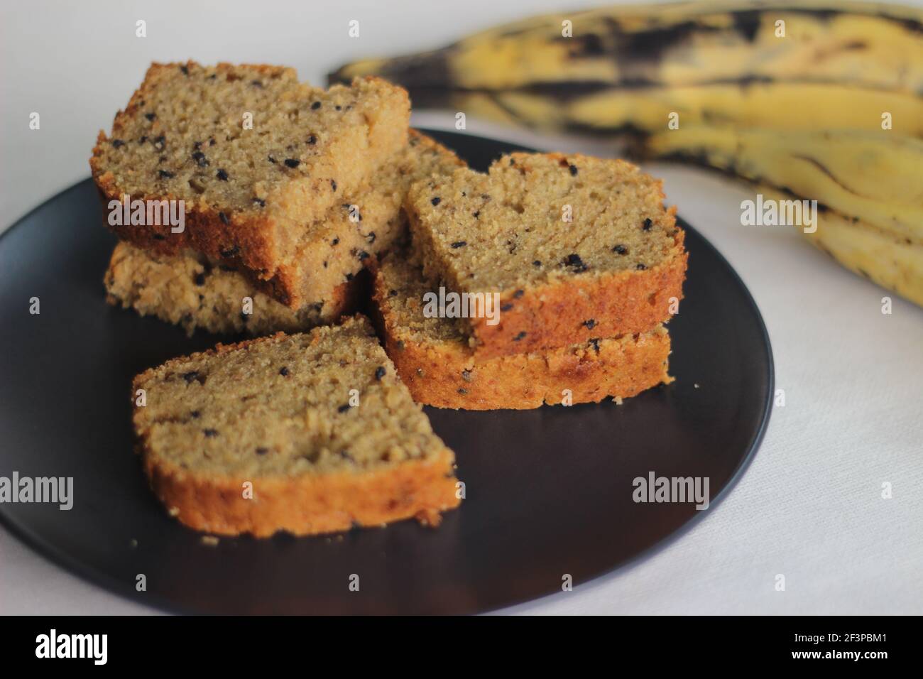 Slices of home baked whole wheat ripe plantain cake. It is also called ...