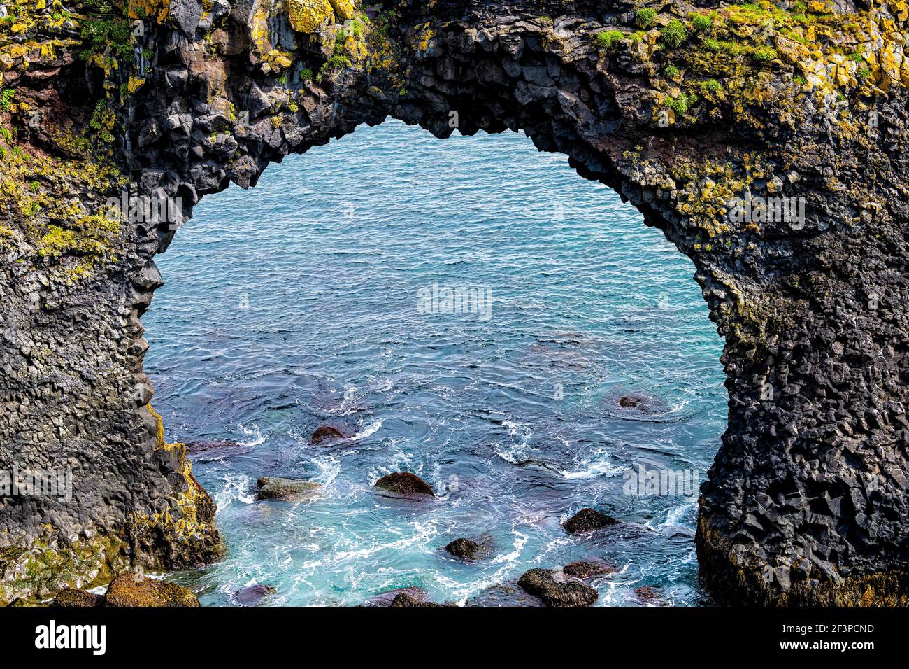 Closeup landscape view of famous Gatklettur arch rock near Hellnar ...