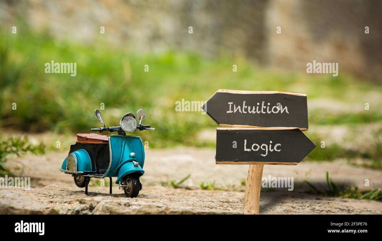 Street Sign the Direction Way to Intuition versus Logic Stock Photo - Alamy