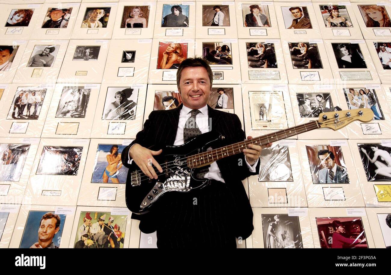 Paul Fraser Of Stanley Gibbons poses with some of the signed autographs ...