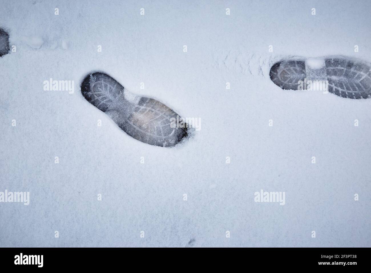 Footprint in melting snow hi-res stock photography and images - Alamy
