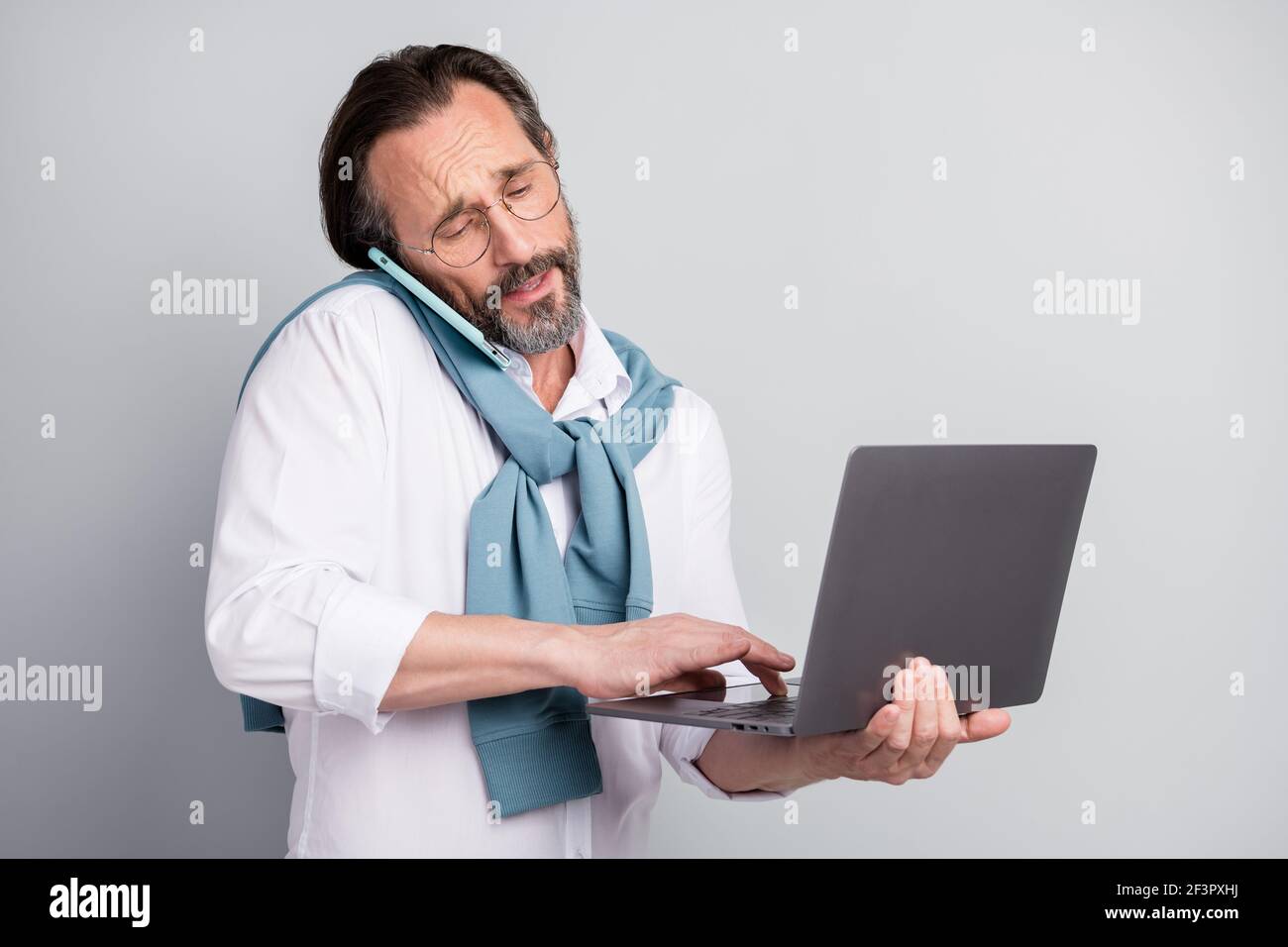 Photo of overworked age man wear white shirt sweater shoulders talking ...