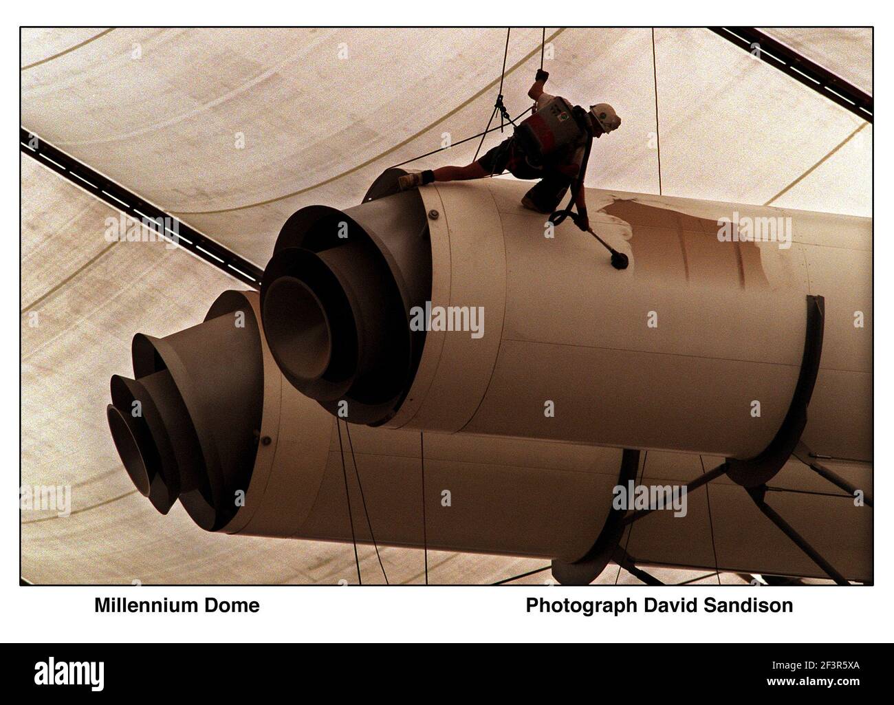 Vacuming dust on air duct in the Millennium Dome June 1999 Stock Photo ...