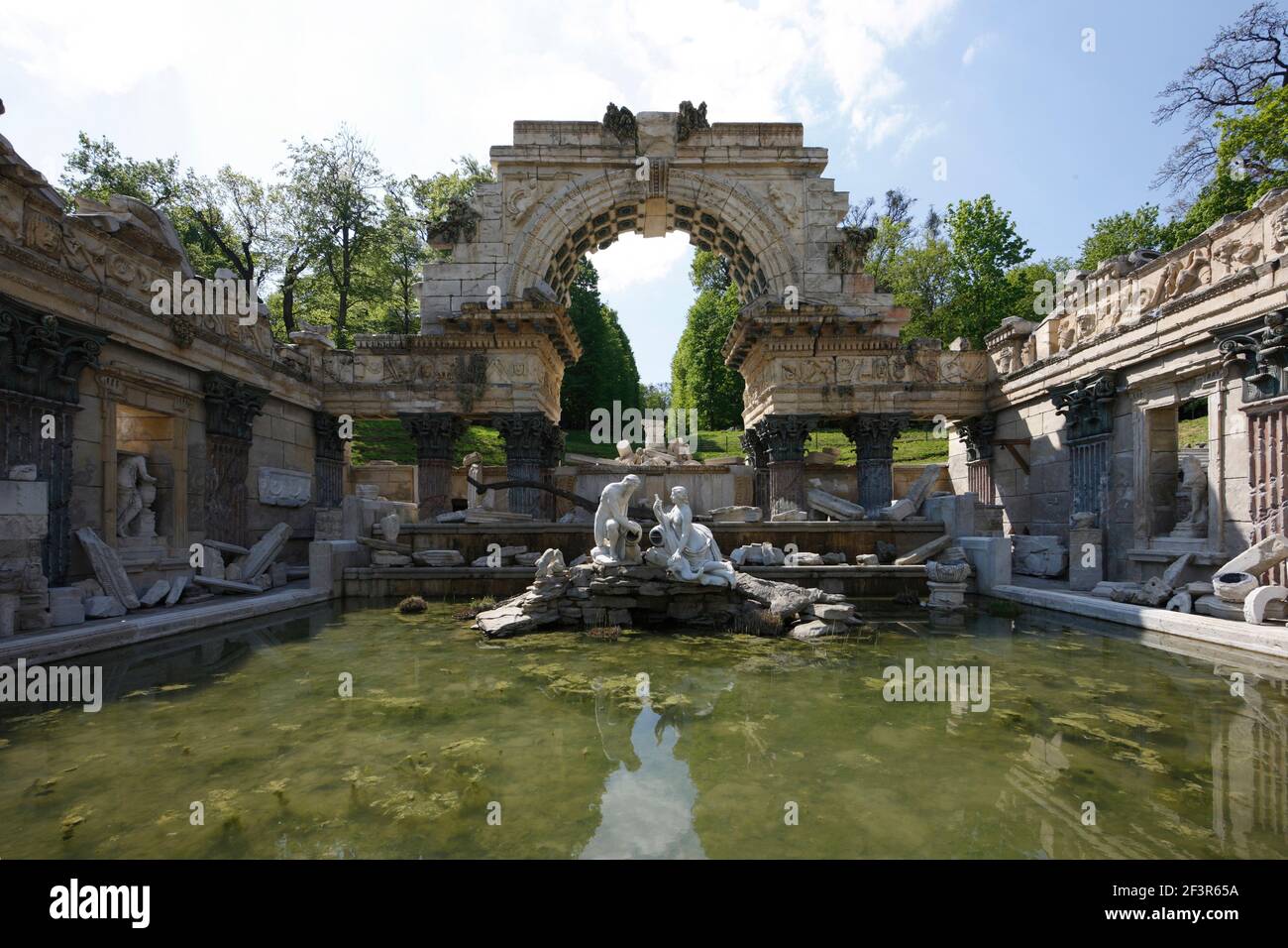 Broken statues, frescoes and arches in fake Roman ruins in palace ...