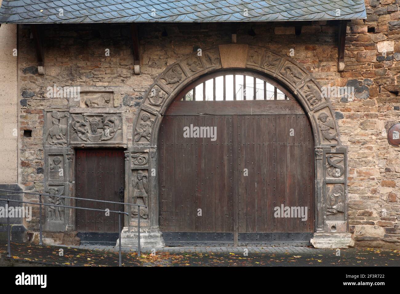 Detail of Romanesque wooden gate of rural church of St Peter and Paul ...
