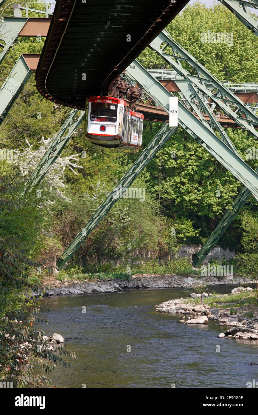 Wuppertal Schwebebahn, or Wuppertal Floating Tram, travelling above a ...