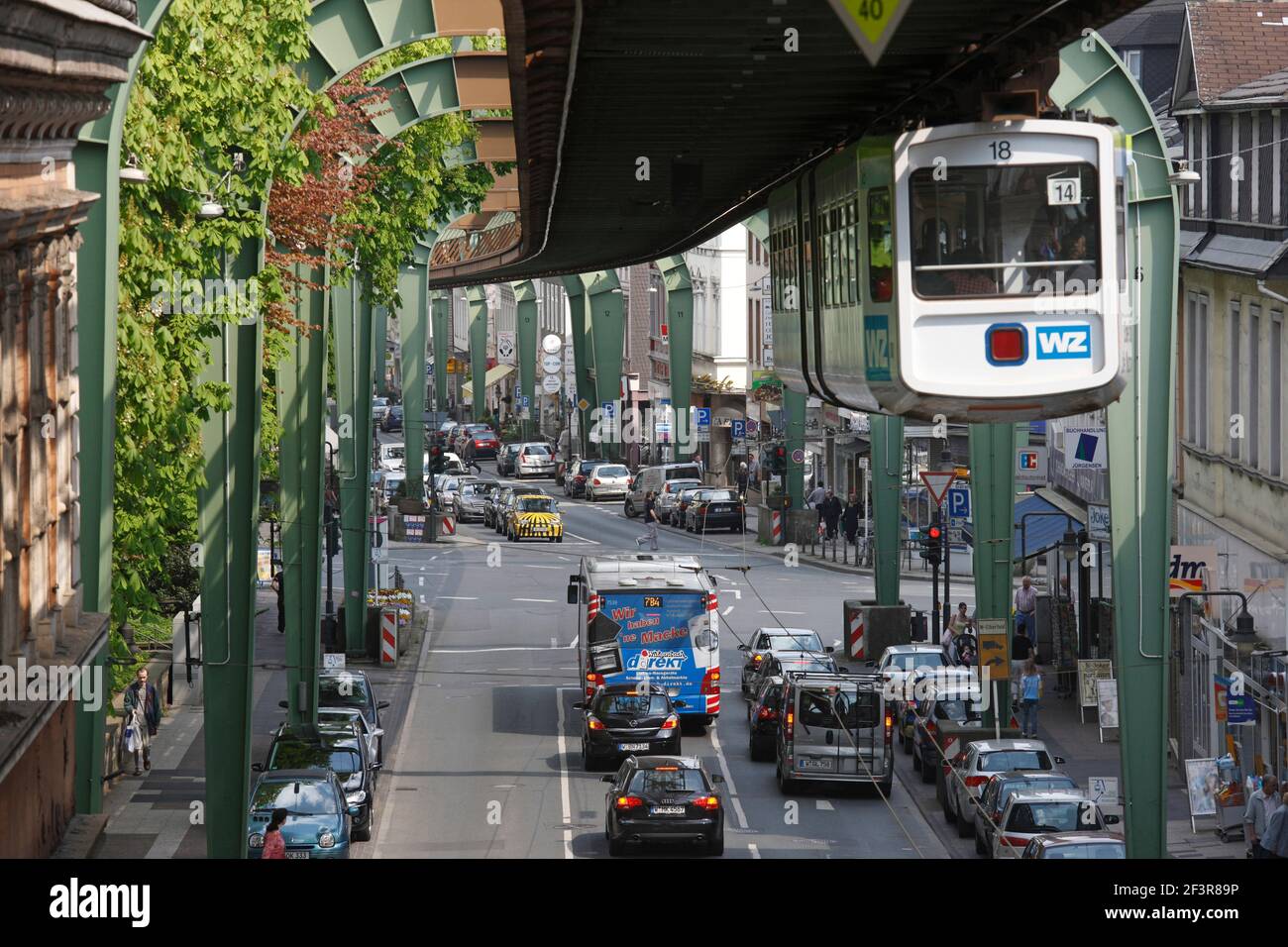 Wuppertal Schwebebahn, or Wuppertal Floating Tram, travelling above a ...