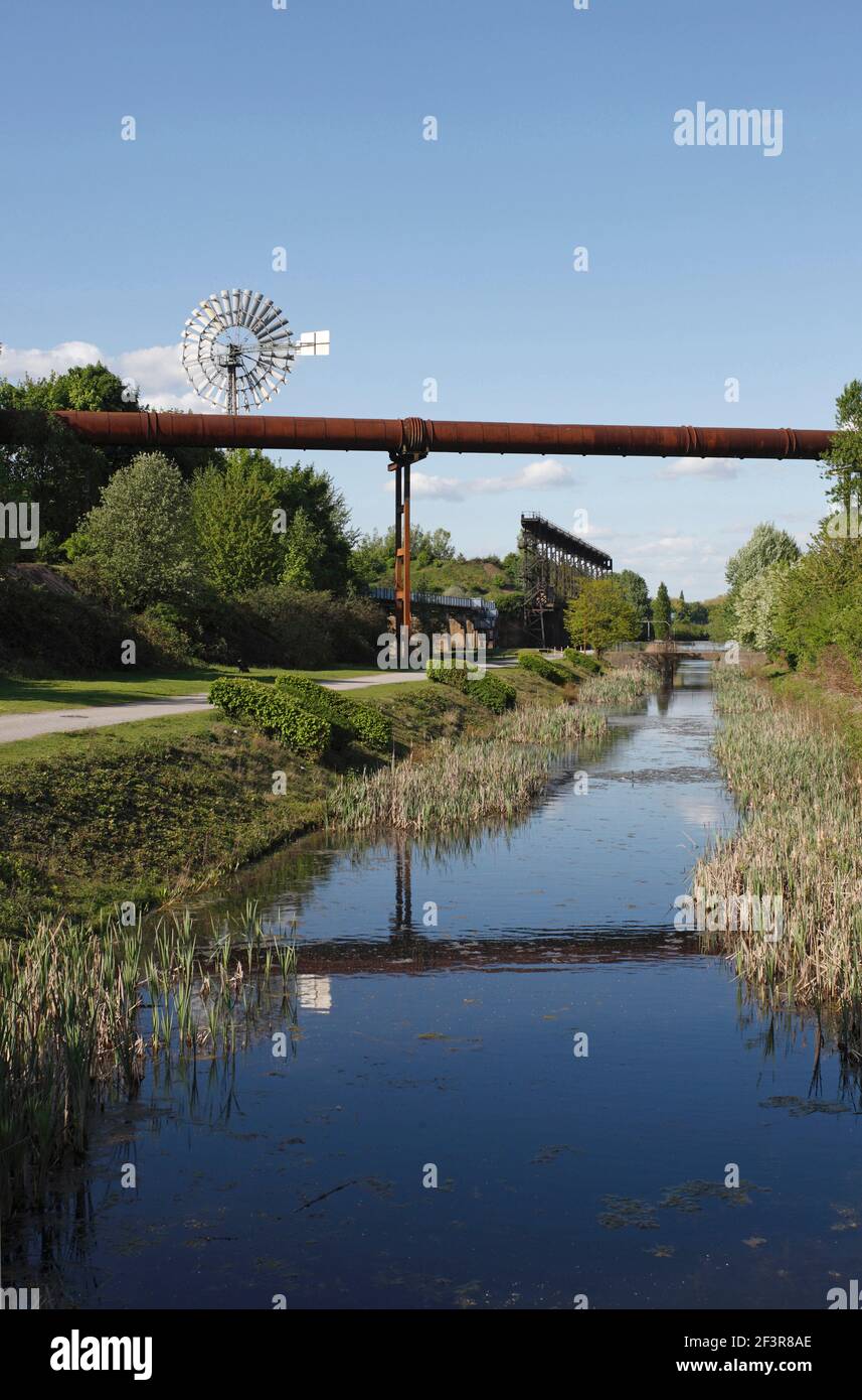 Drainage ditch and pathway in the landscaped park of the former ...