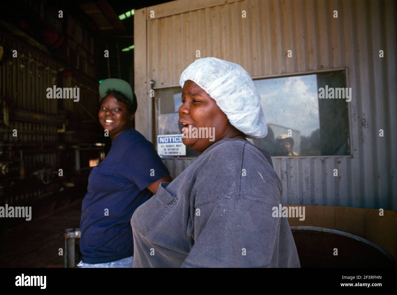 Mississippi USA Female Workers in Gin Mill Smiling Stock Photo - Alamy