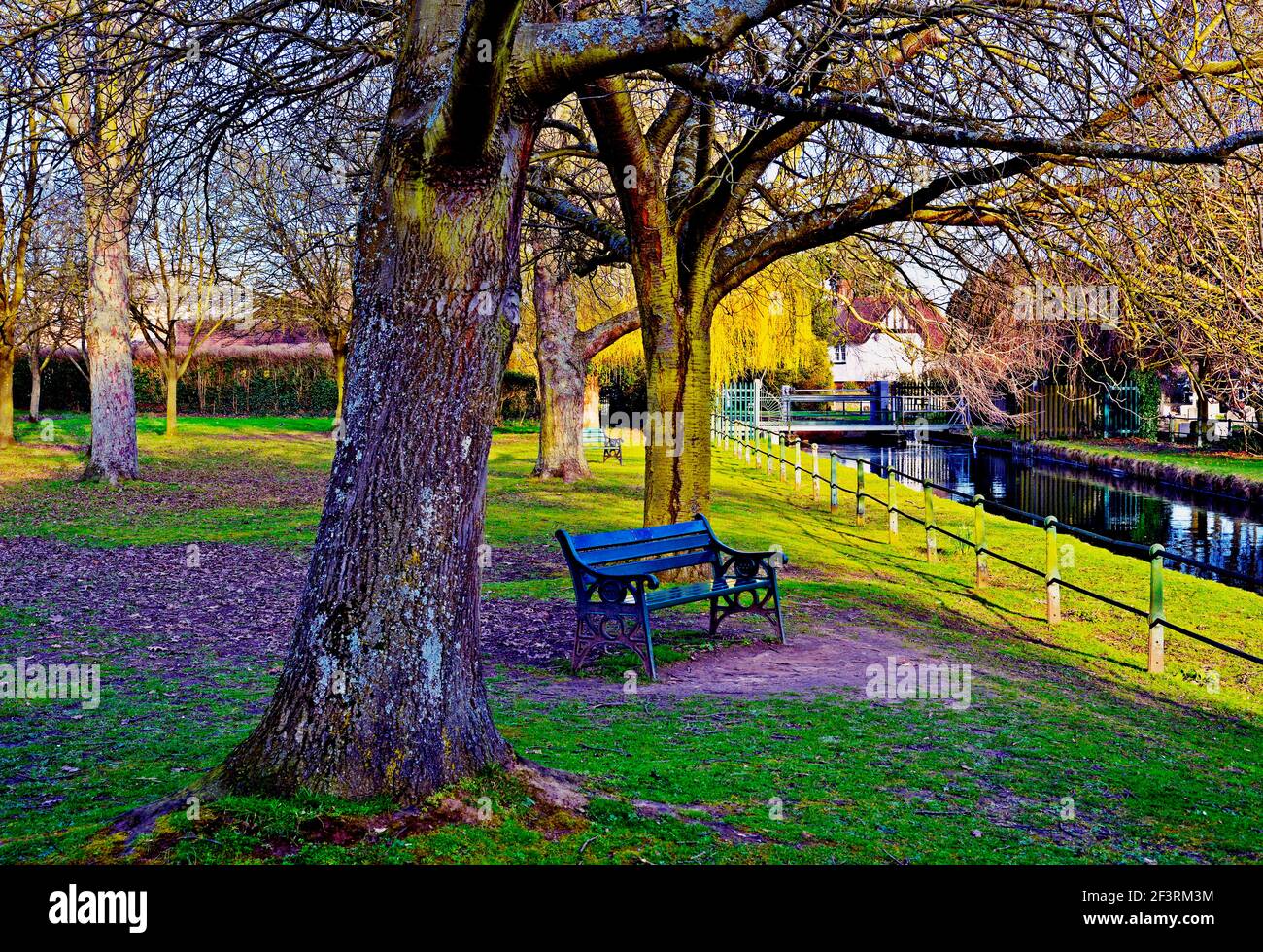 Benches next to a river Stock Photo - Alamy