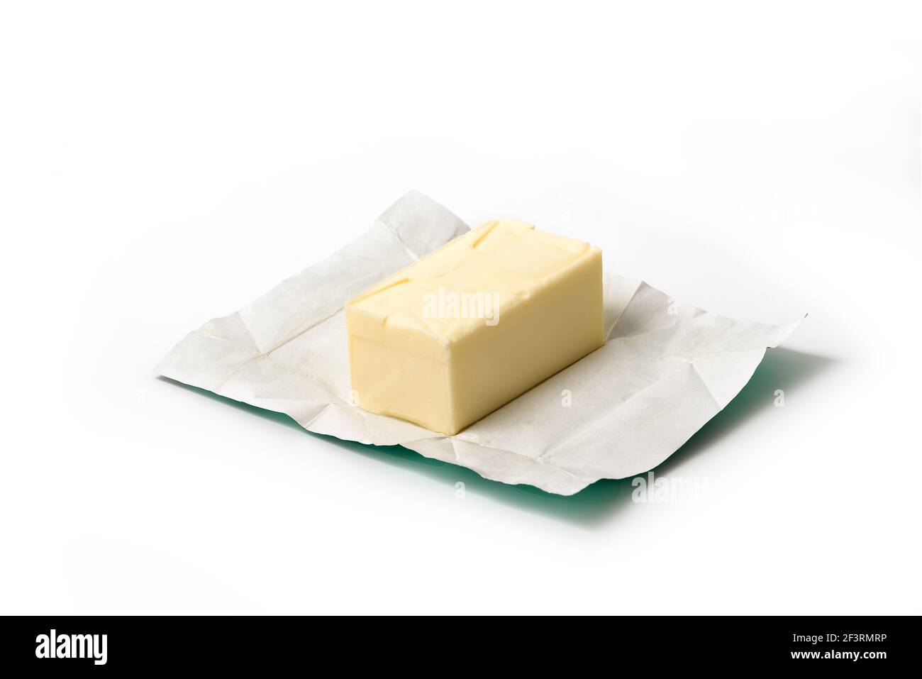 Traditional butter block unwrapped for use as a baking ingredient ...