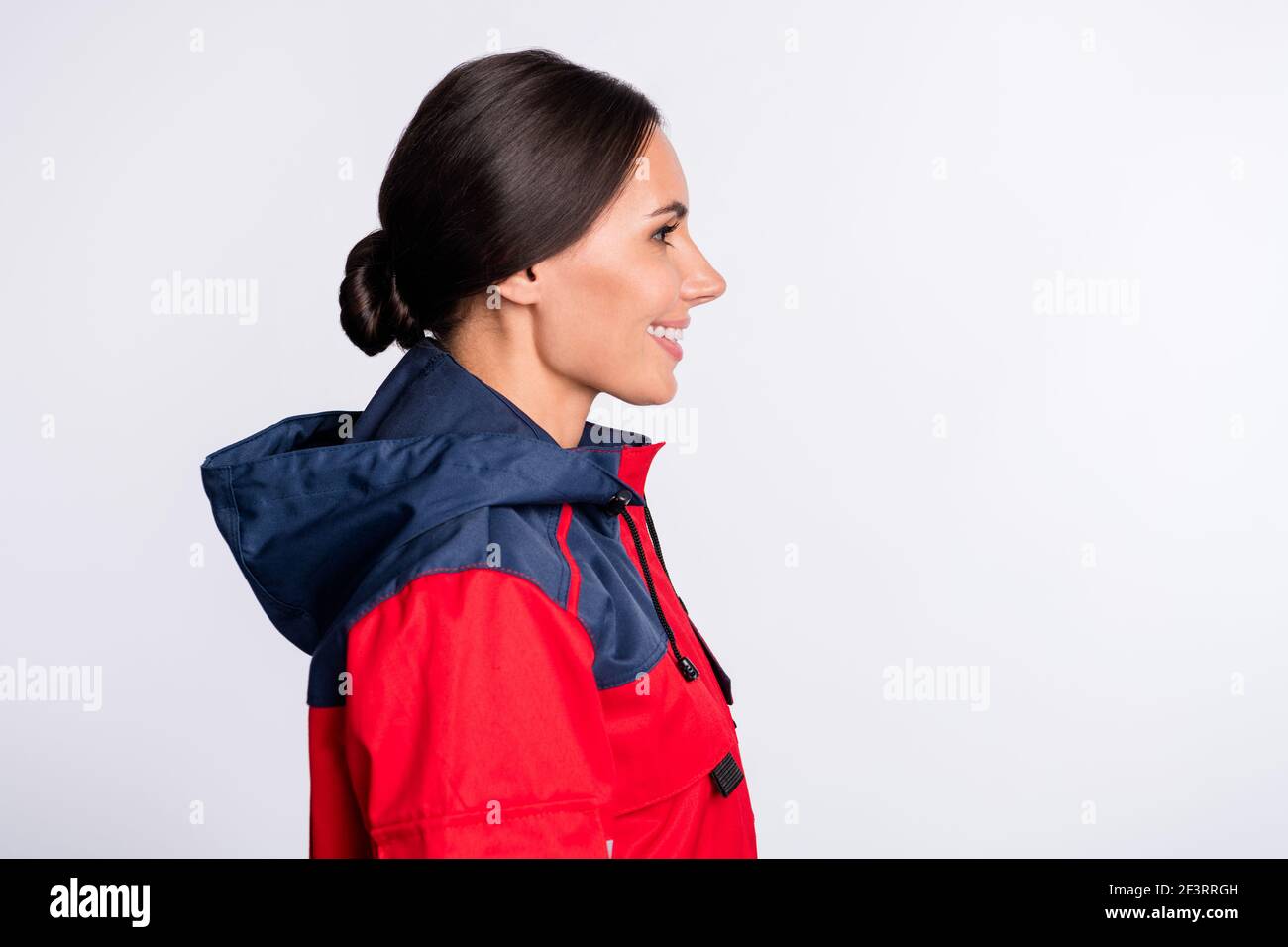 Photo of cheerful pretty young woman paramedic wear red jacket smiling ...