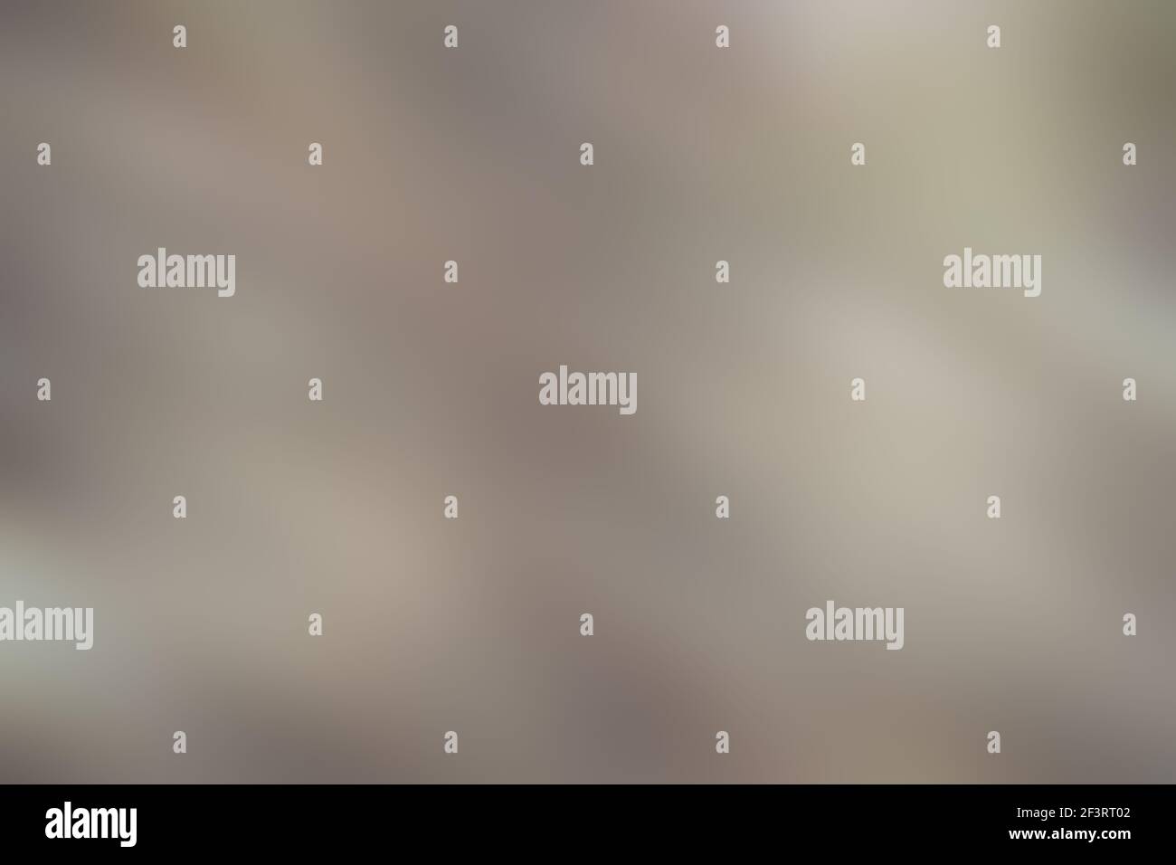 Abstract blurred backgrounds of light tan color tone with flare light ...