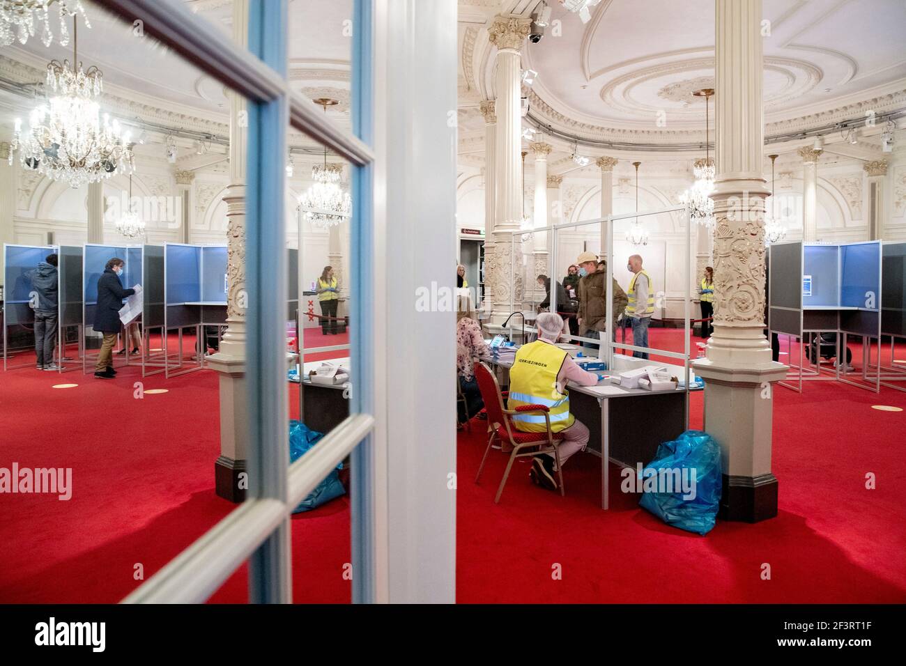 AMSTERDAM, NETHERLANDS - MARCH 17: People are seen casting their vote ...