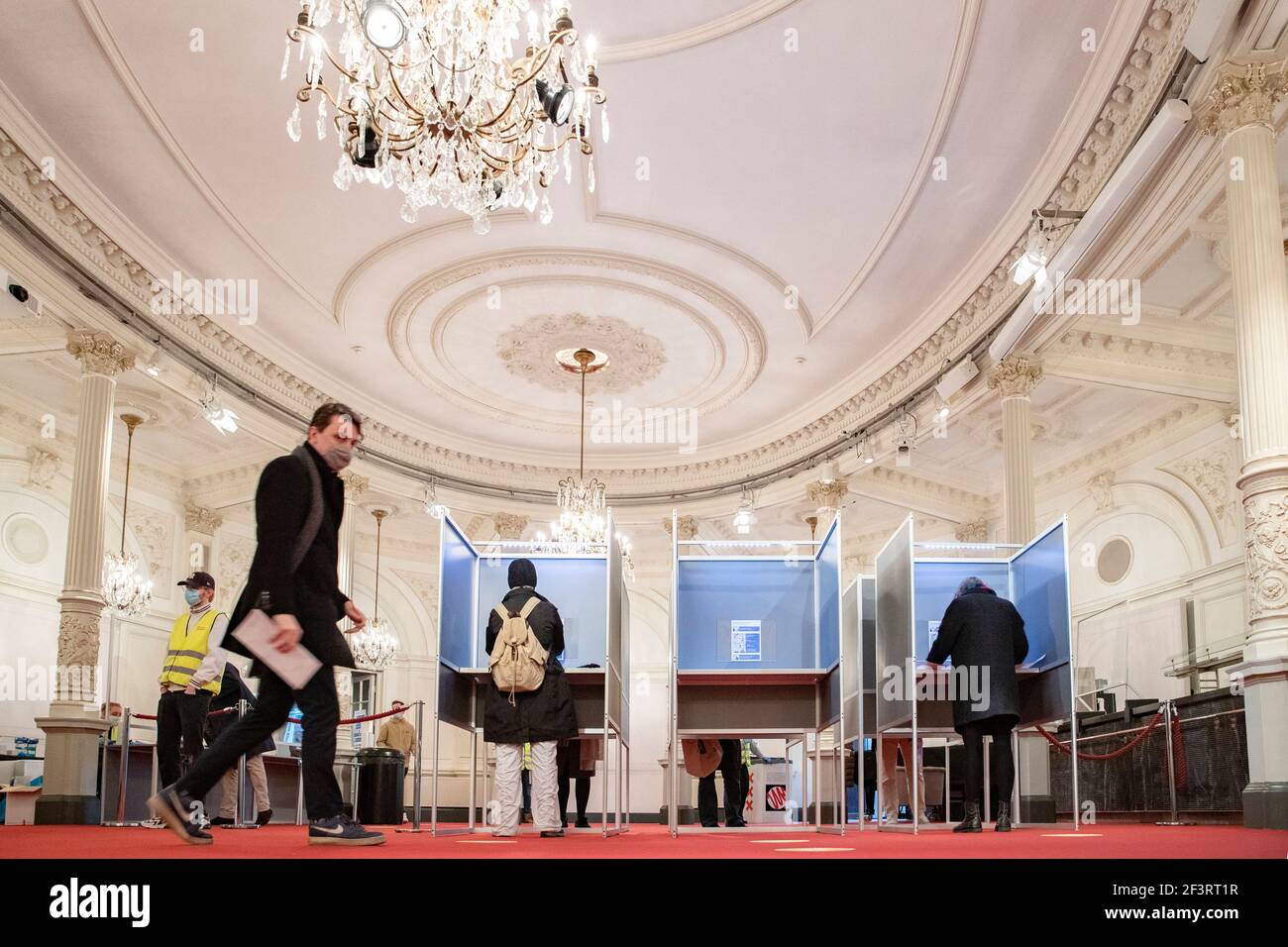 AMSTERDAM, NETHERLANDS - MARCH 17: People are seen casting their vote ...