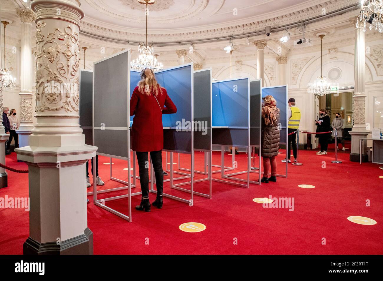 AMSTERDAM, NETHERLANDS - MARCH 17: People are seen casting their vote ...