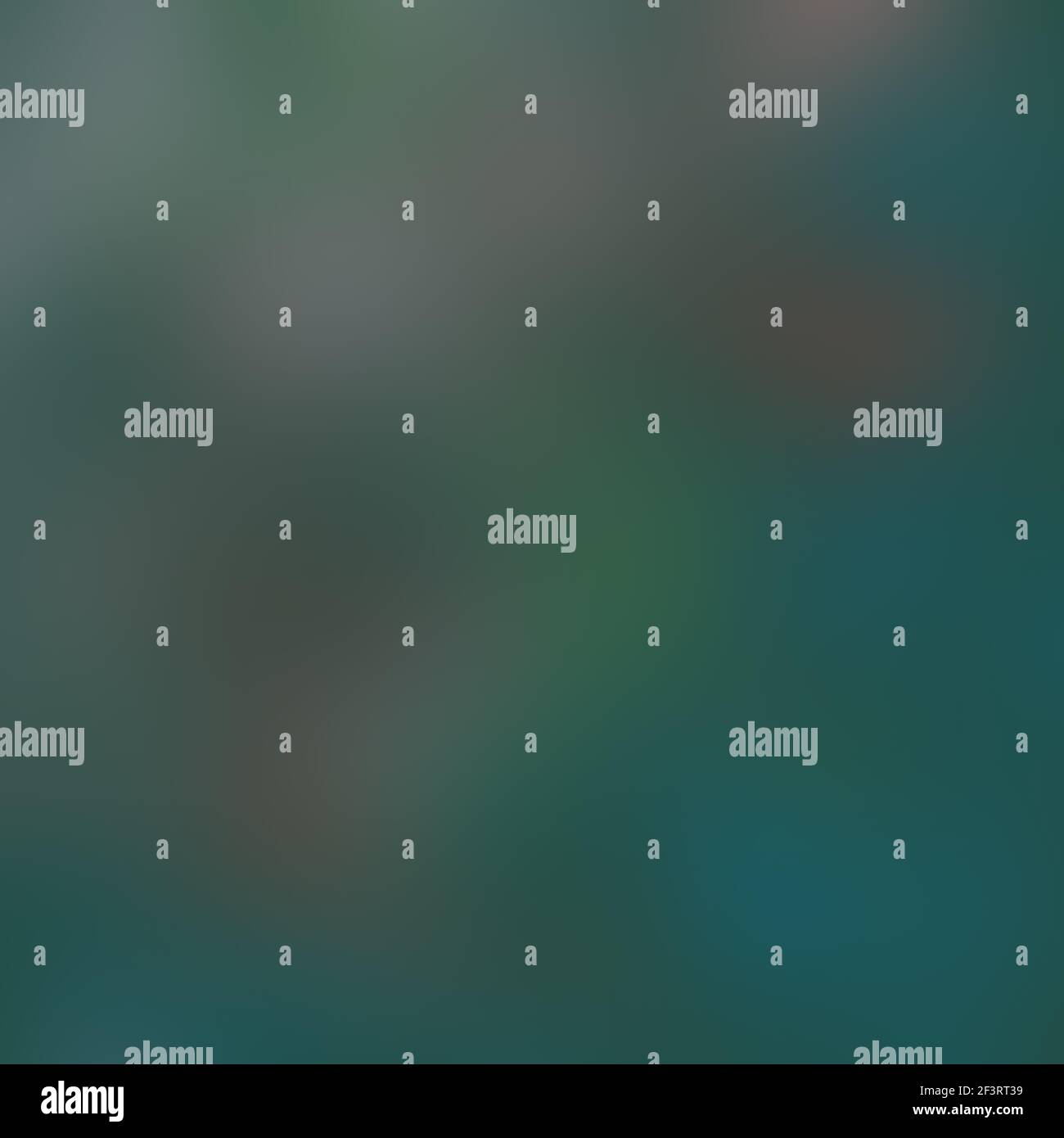 Abstract blurred background with dominant soft dark emerald color tone ...
