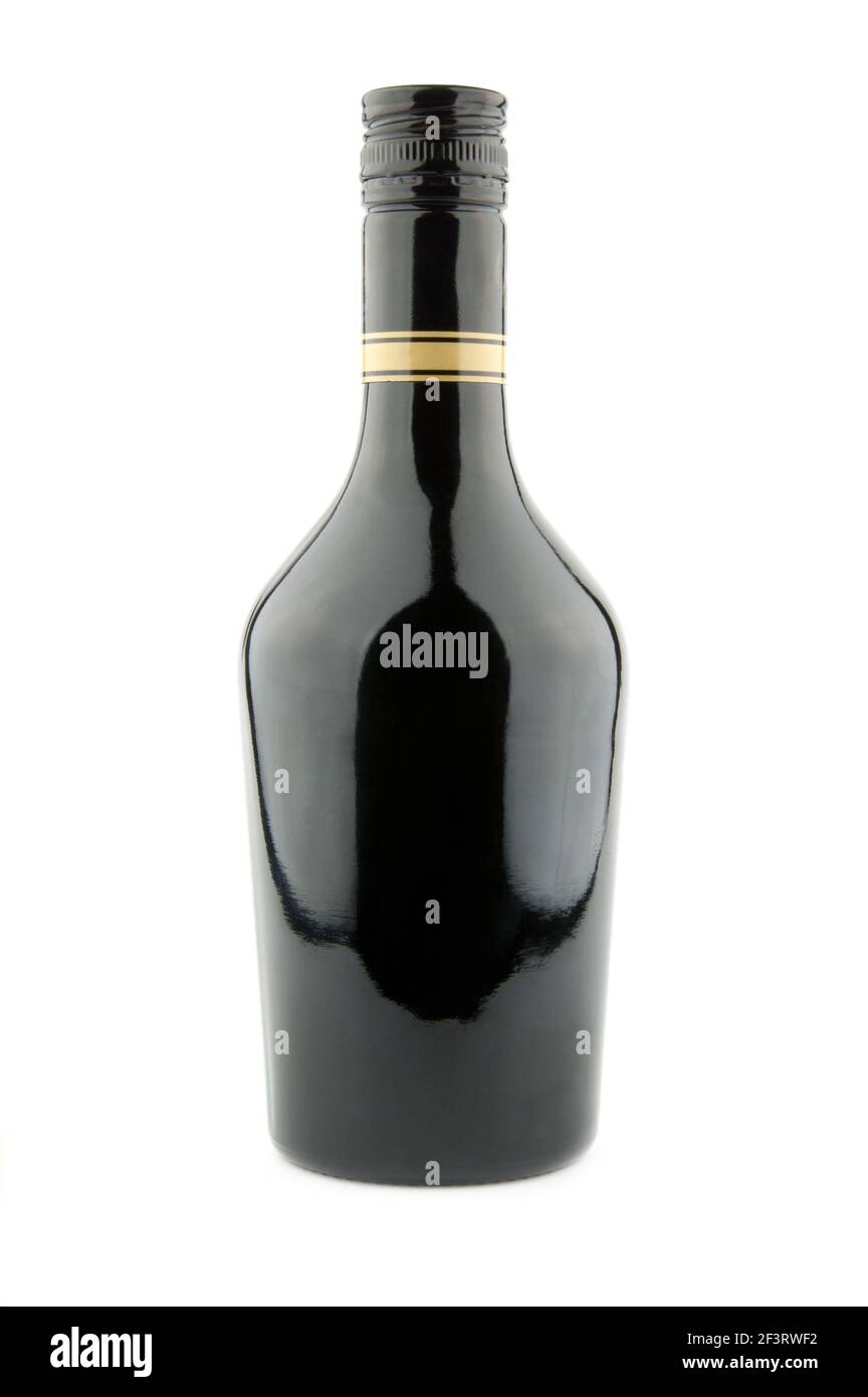 Black liqueur bottle isolated on a white background Stock Photo - Alamy