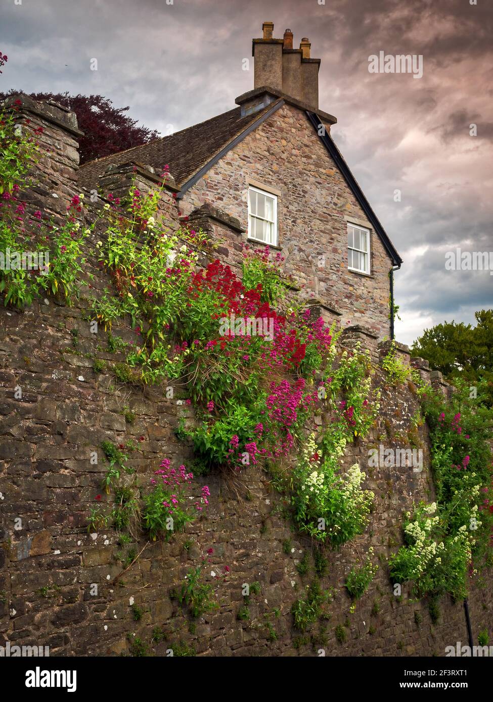The magnificent walls of the Brecon Cathedral grounds in Brecon, mid ...